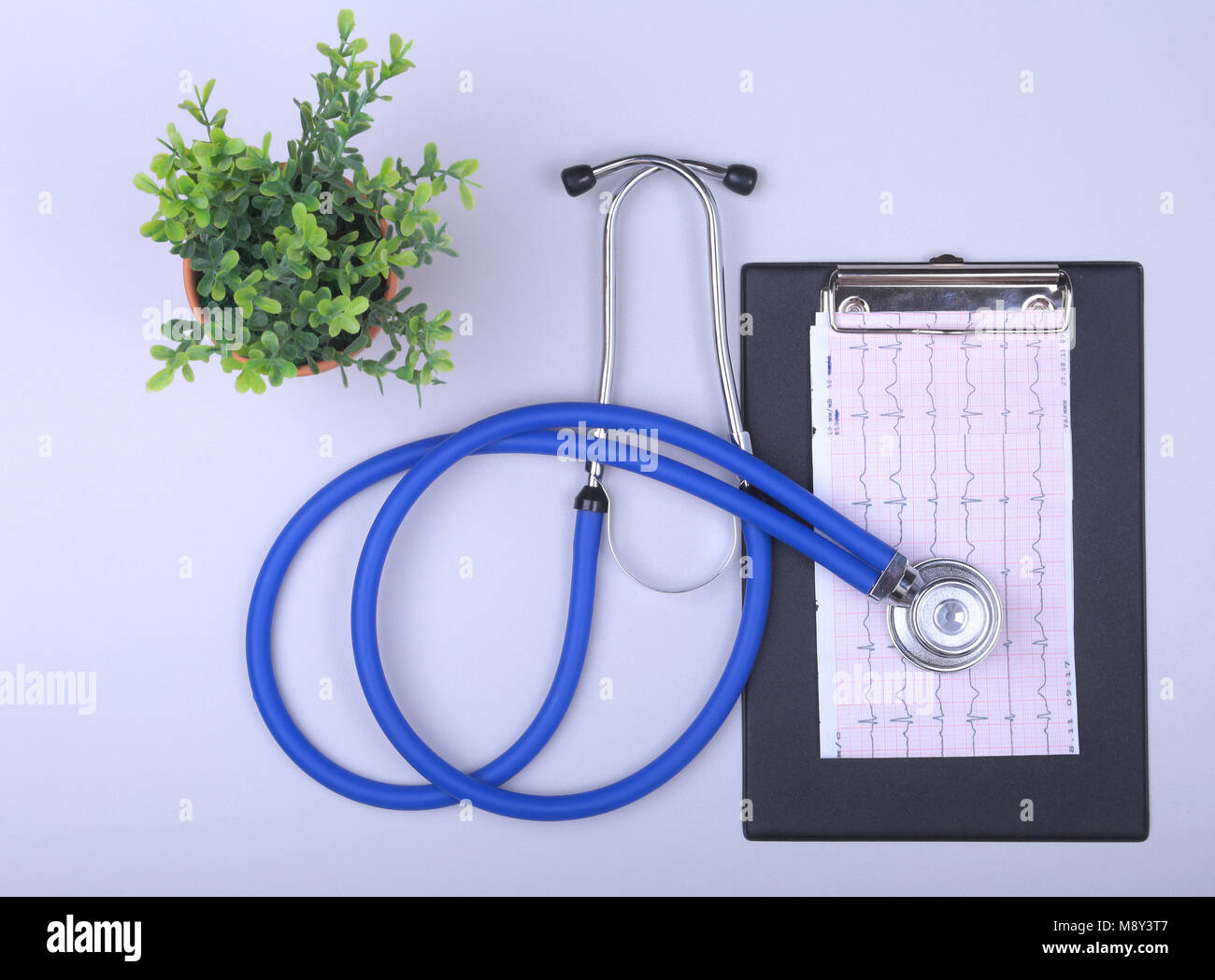 Stethoscope on a modern keyboard, RX prescription on white table with ...