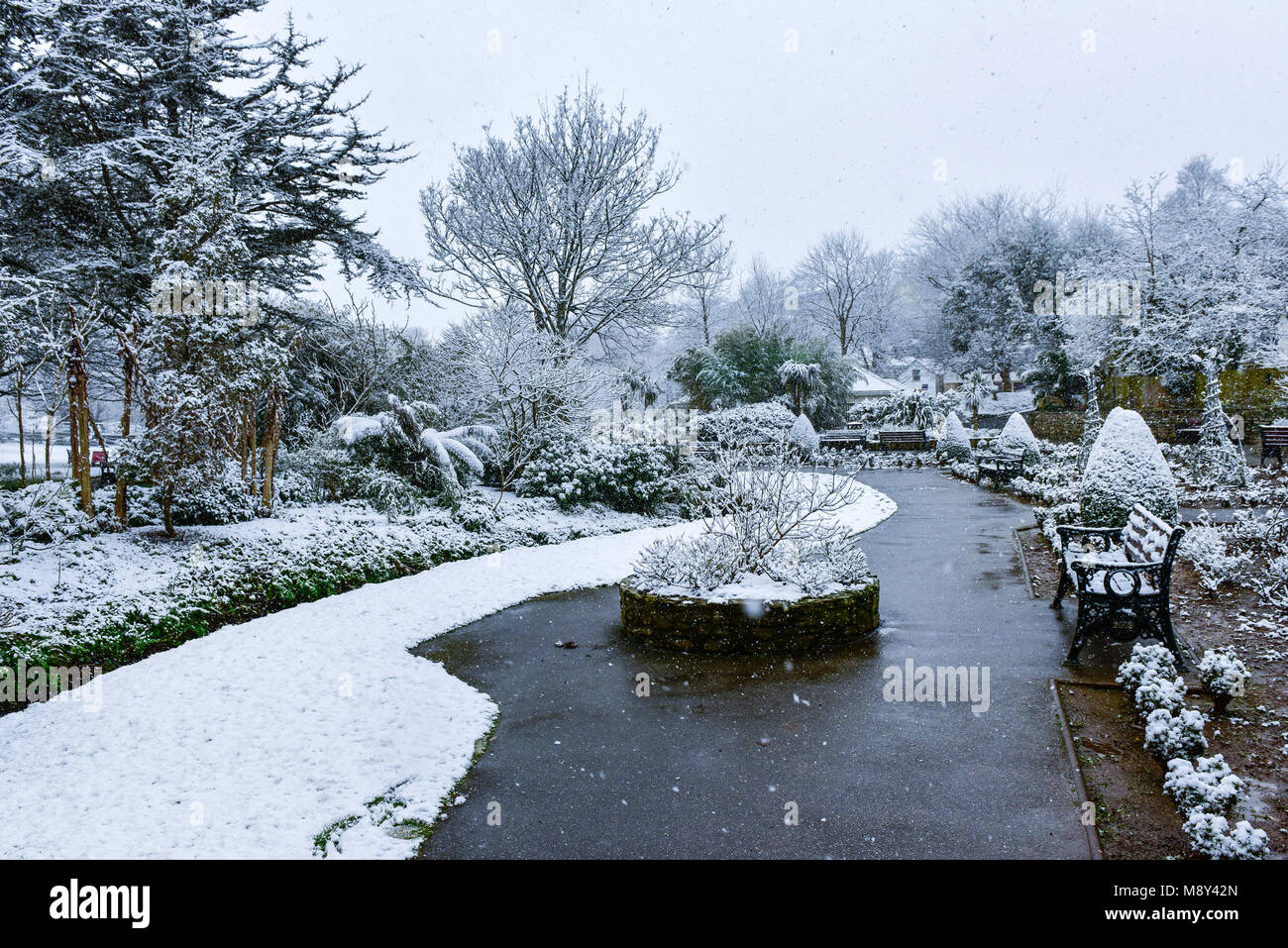 Snow falling over the historic trenance gardens in Newquay Cornwall ...
