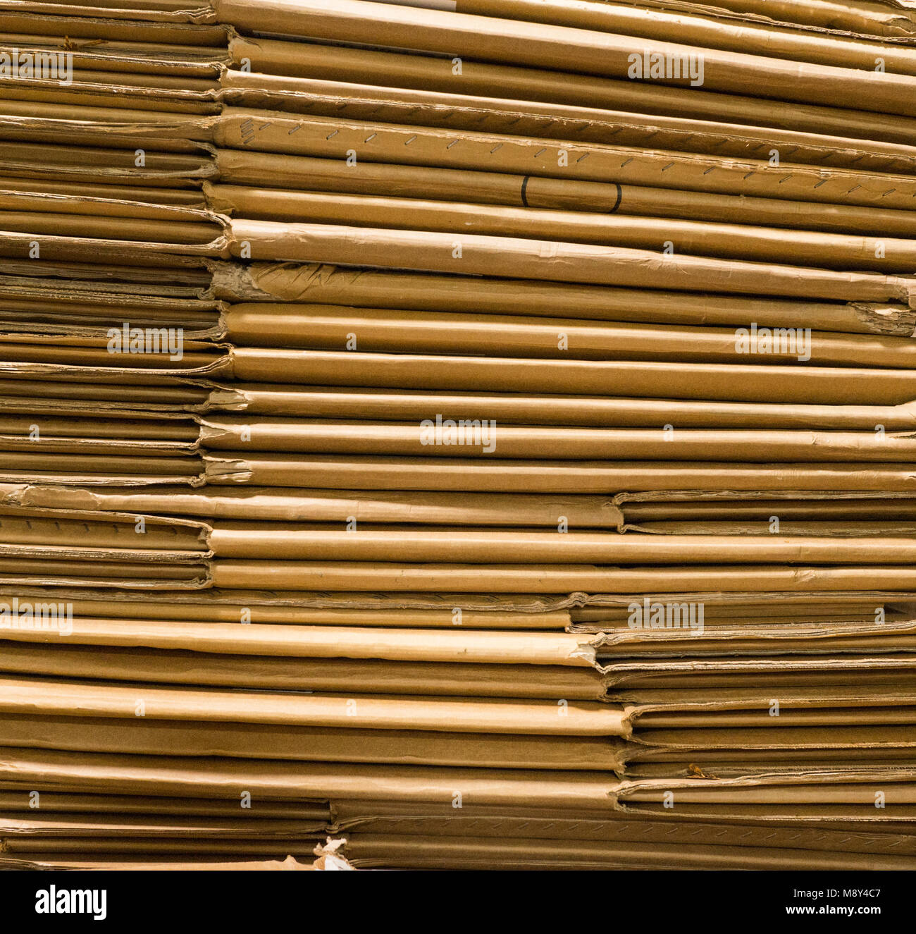 Cardboard boxes folded flat Stock Photo - Alamy