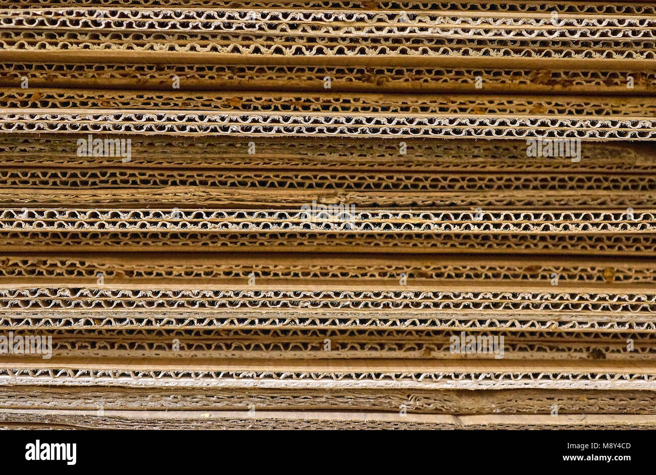 Cardboard boxes folded flat Stock Photo - Alamy