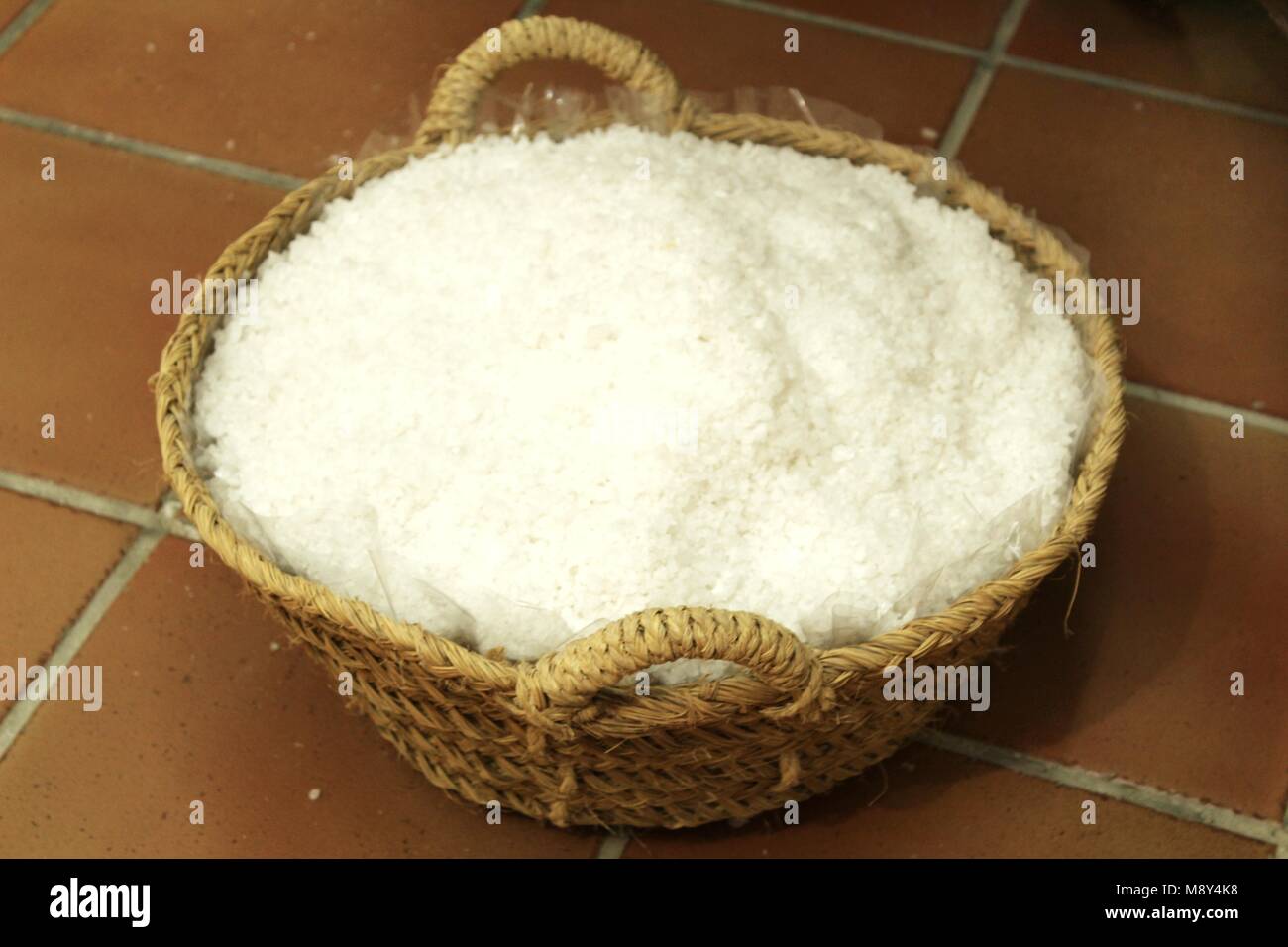 Sea salt stored for processing in Santa Pola saltworks Stock Photo - Alamy