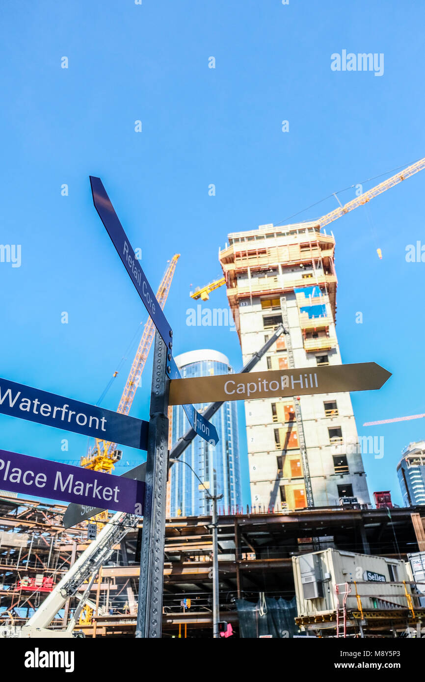 Seattle downtown road signs with new buildings under construction and ...