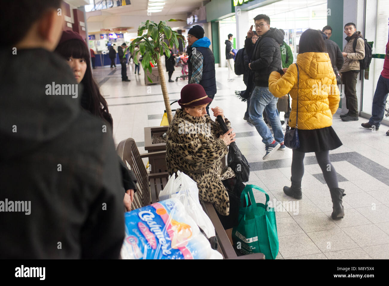 People walk through Jackson Square Mall in downtown Hamilton, Ontario ...