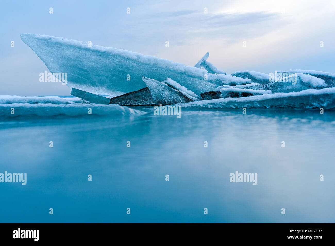 Floating cracked ice sheets Stock Photo - Alamy