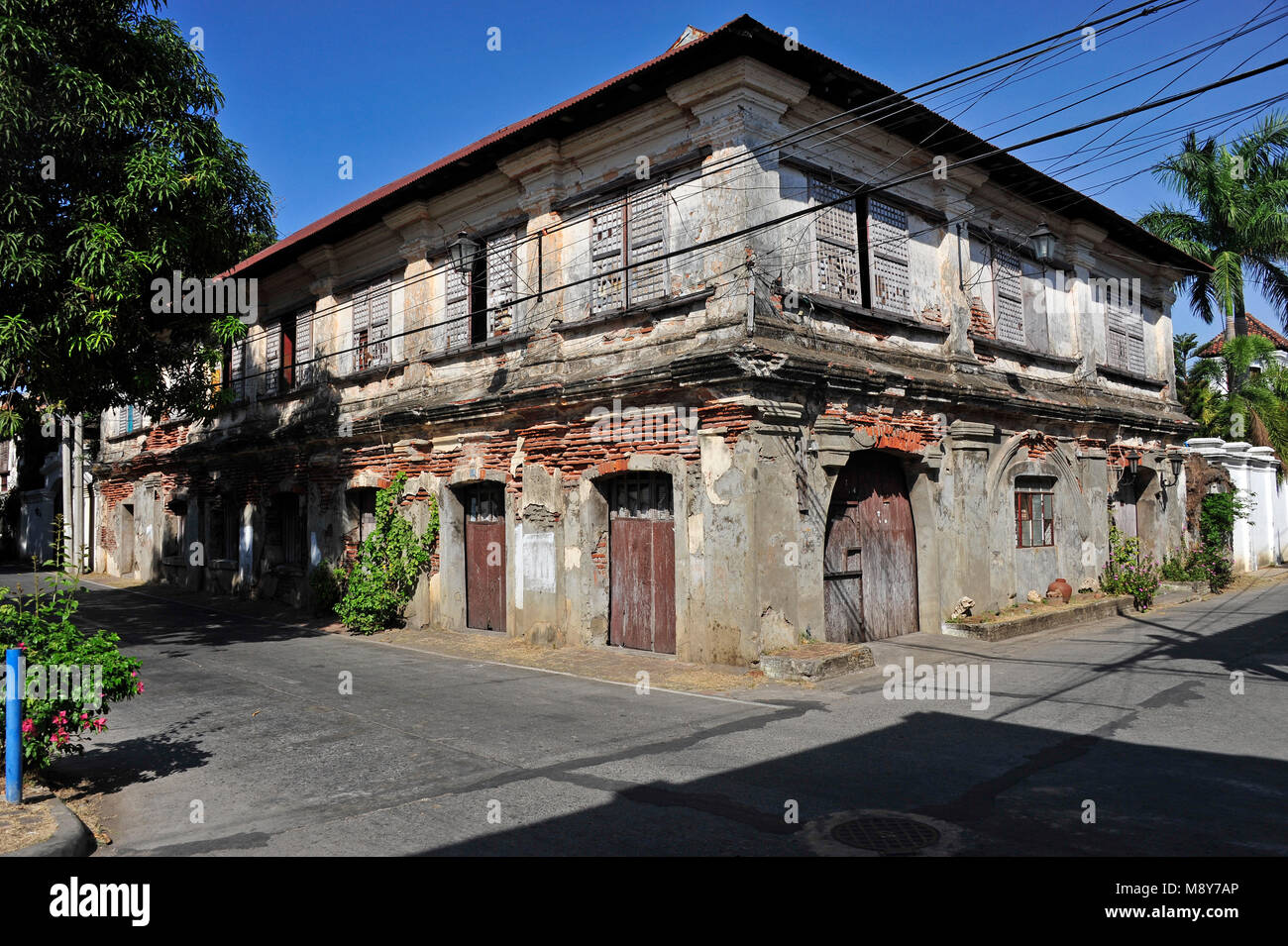 Unrestored building on a street corner in Vigan city, Ilocos Sur ...