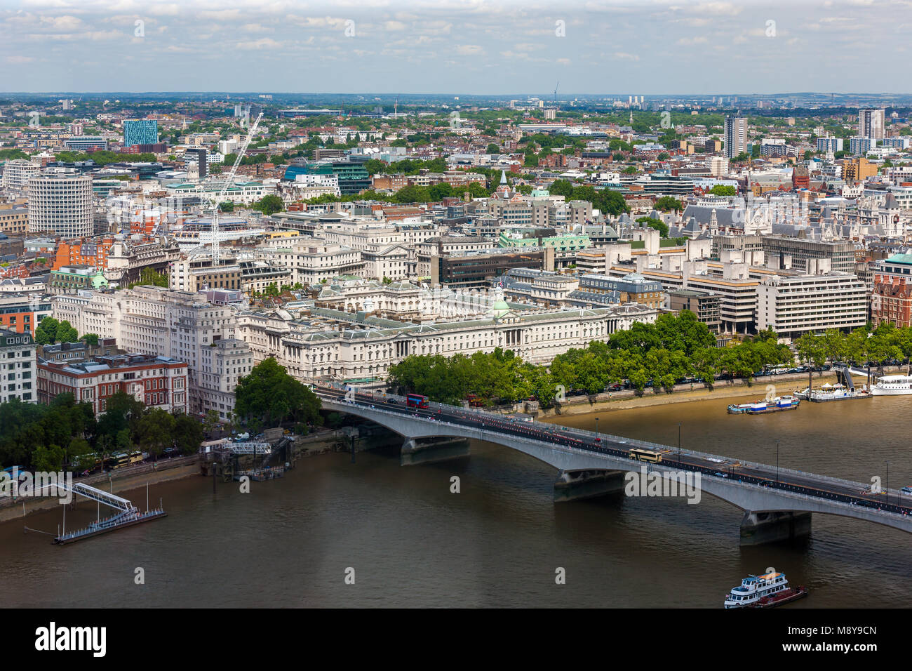 Aerial view of Waterloo Bridge across River Thames and East London ...