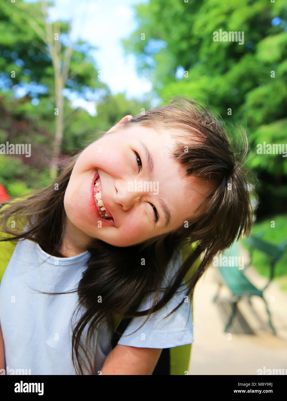 Little girl have fun outside in the park Stock Photo - Alamy