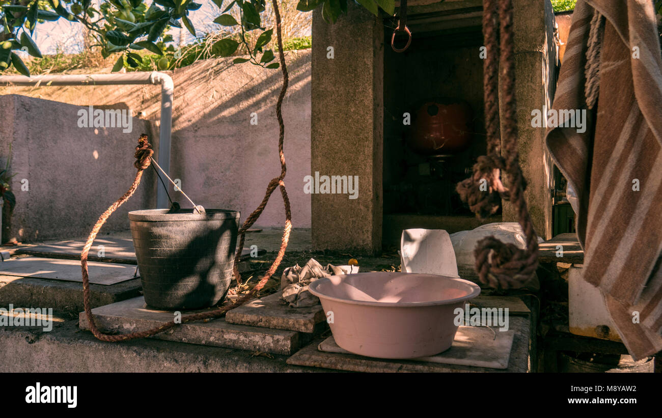 Water pump bucket hi-res stock photography and images - Alamy