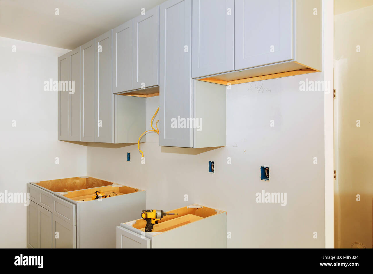 Kitchen cabinets installation Blind corner cabinet, island drawers and ...