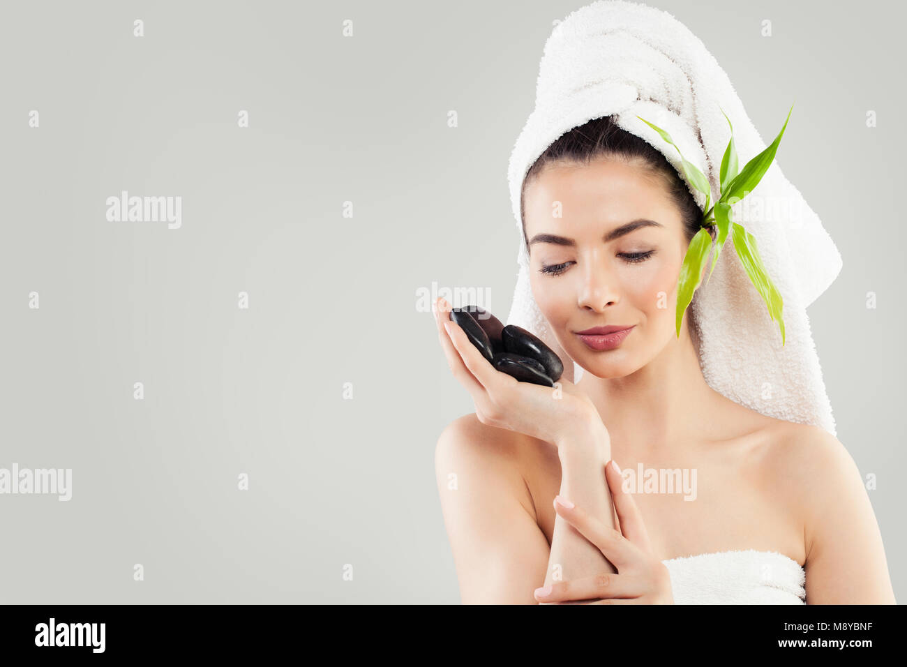 Spa Beauty Portrait of Spa Model with Green Bamboo and Black Stones in ...