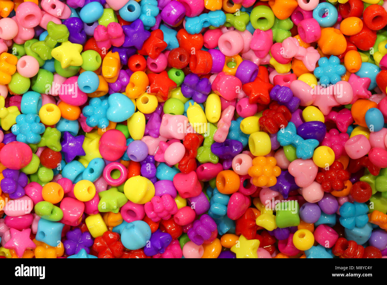 background of colored beads to make necklaces Stock Photo - Alamy