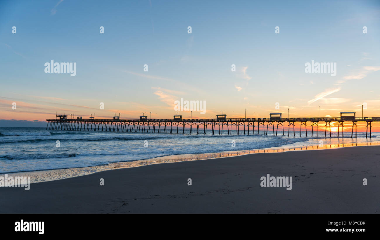 Sunset at the north carolina beach with atlantic beach pier and sunrise ...