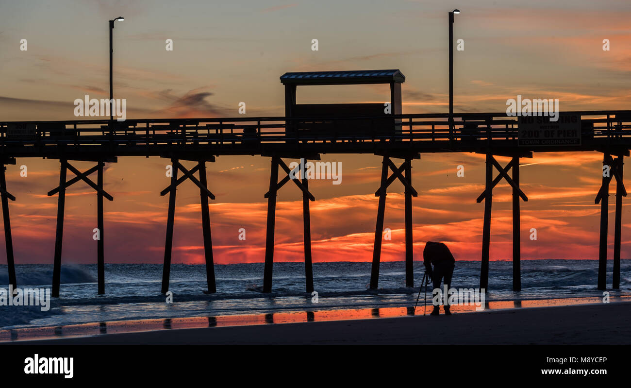 Sunset at the north carolina beach with atlantic beach pier and sunrise ...