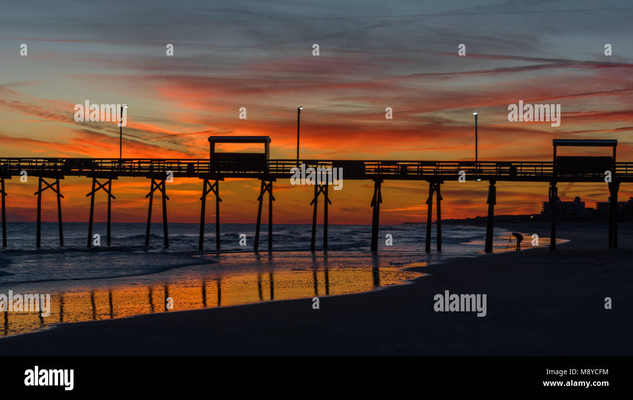 Sunset at the north carolina beach with atlantic beach pier and sunrise ...