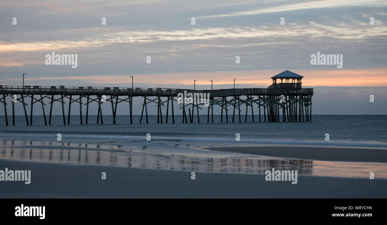 sunset at the north carolina beach with atlantic beach pier and sunrise ...