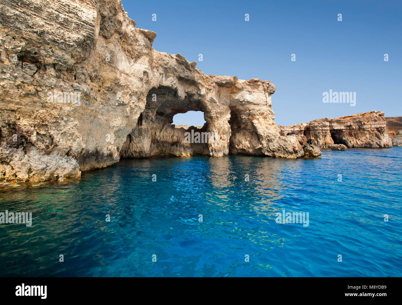 Malta cliffs at sea level Stock Photo - Alamy