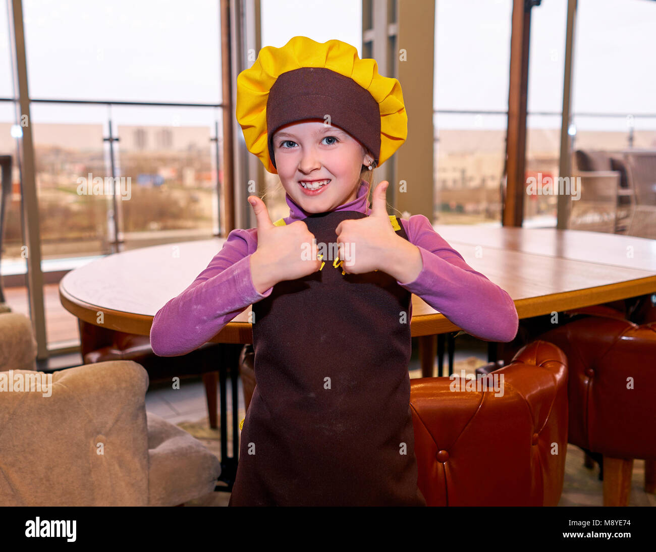 girl in the hood chef restaurant Stock Photo - Alamy