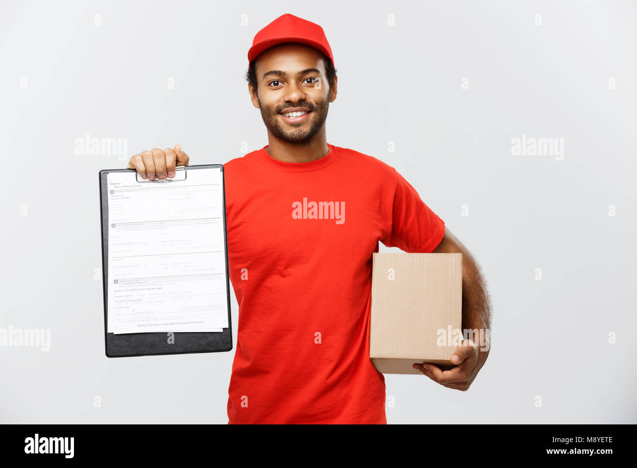 Delivery Concept - Portrait of Handsome African American delivery man ...