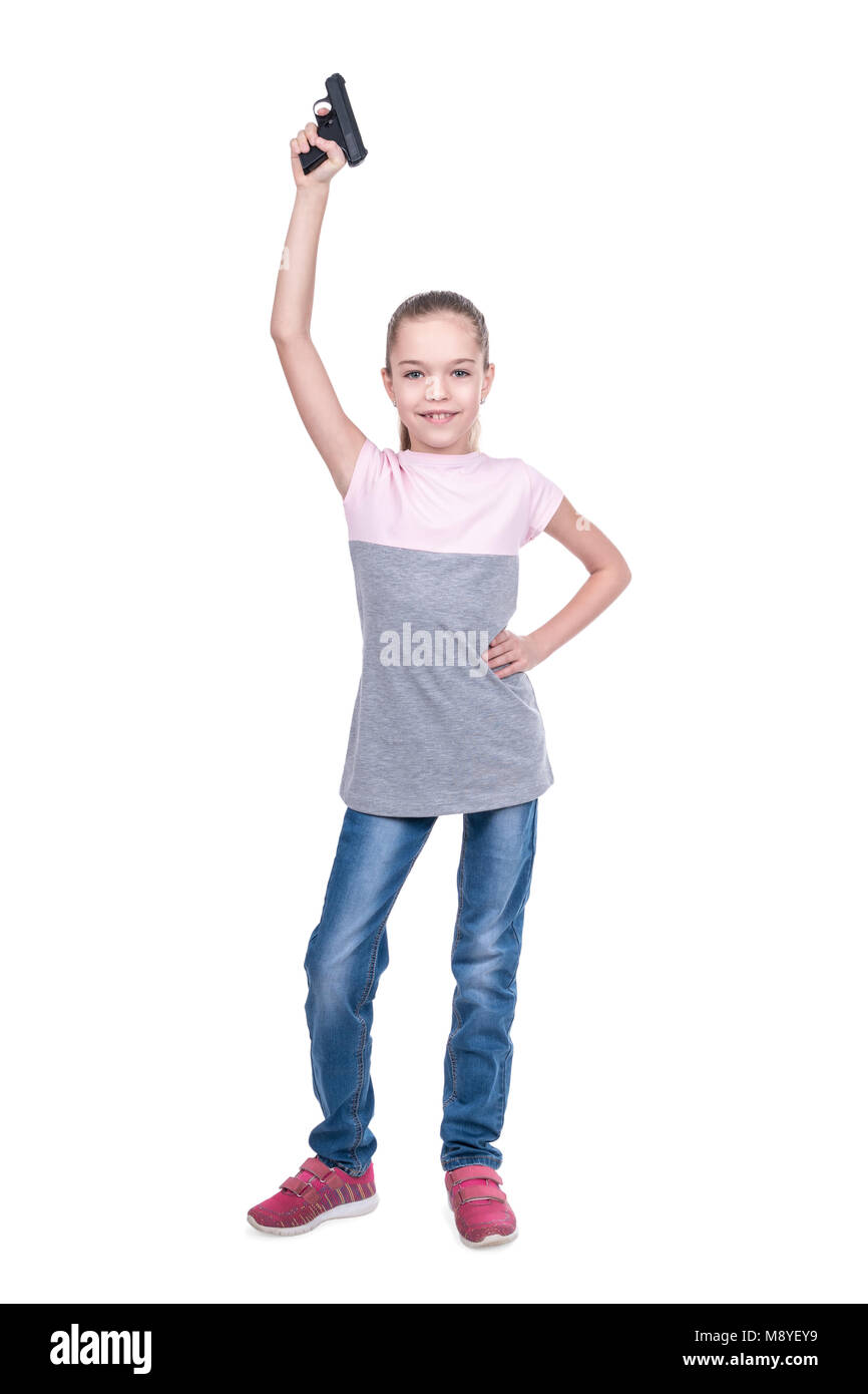 Young cute girl lifted a gun up, isolated on a white background Stock ...