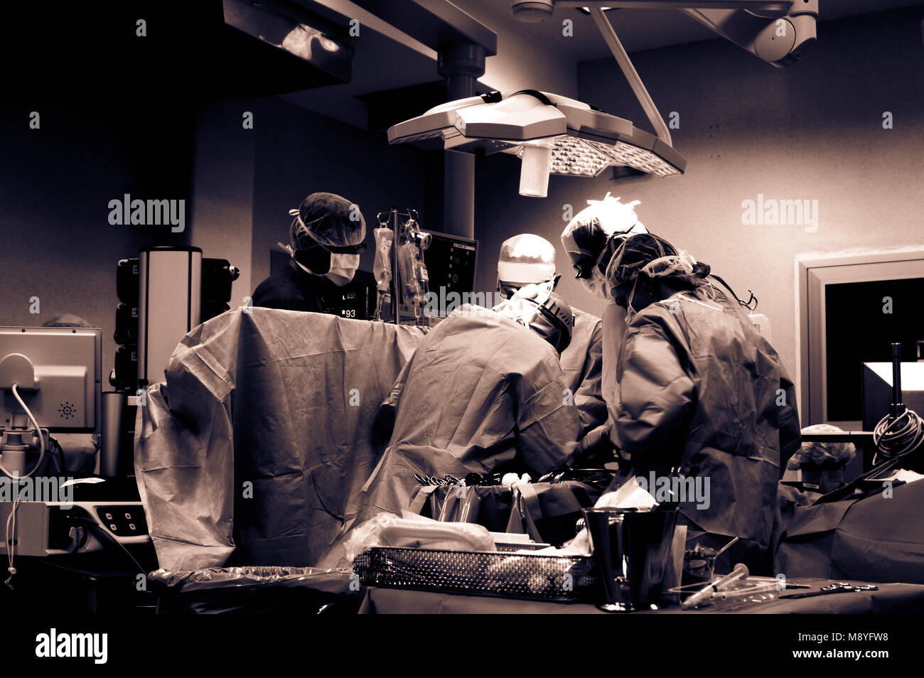 Surgeons at work Stock Photo - Alamy