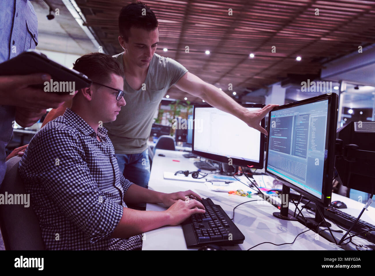 startup business people group working as team to find solution to ...