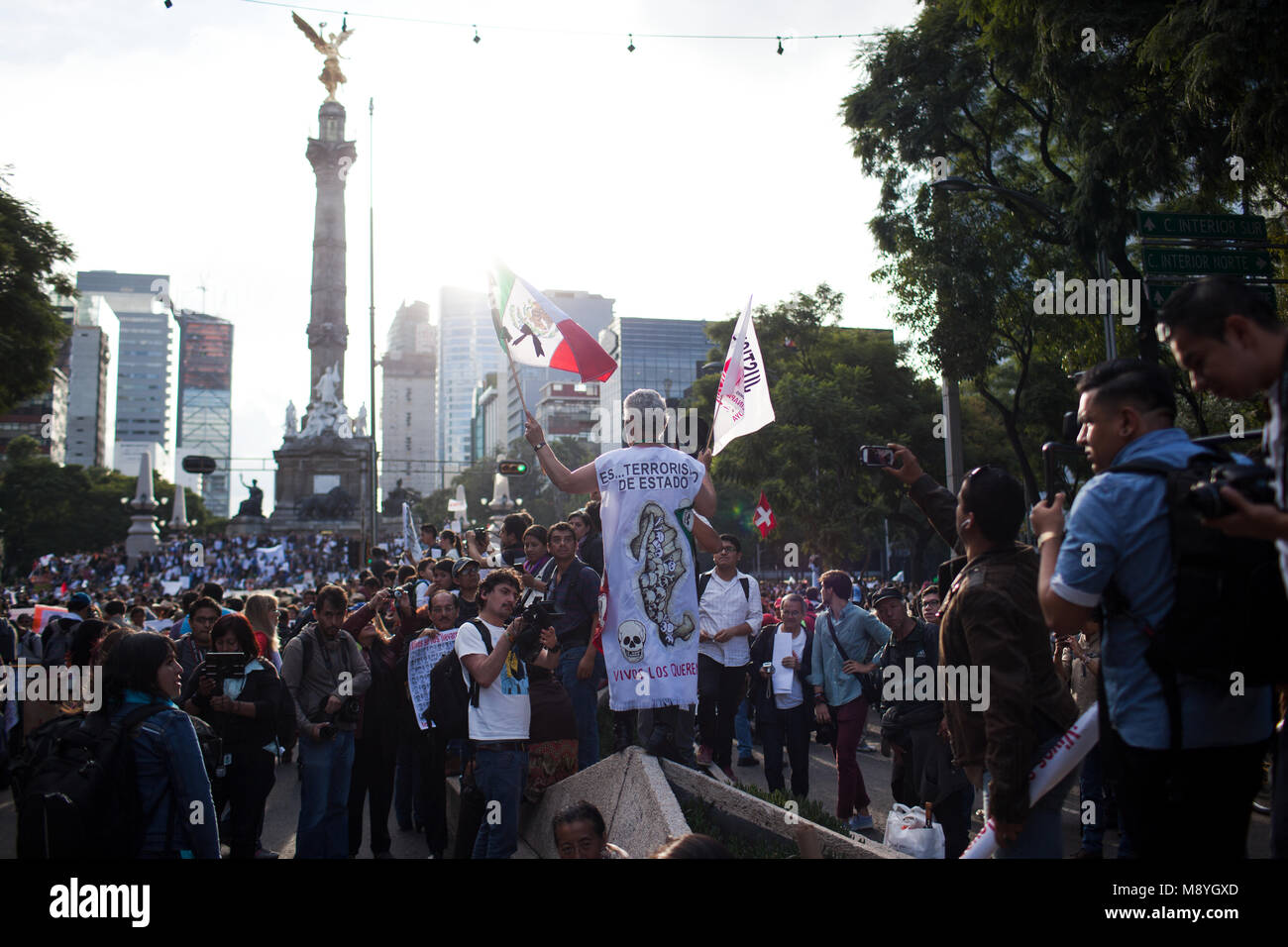 People march through Mexico City protesting for the return of 43 ...
