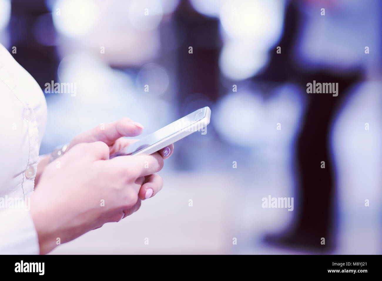 female manager using cell telephone in startup office interior Stock ...