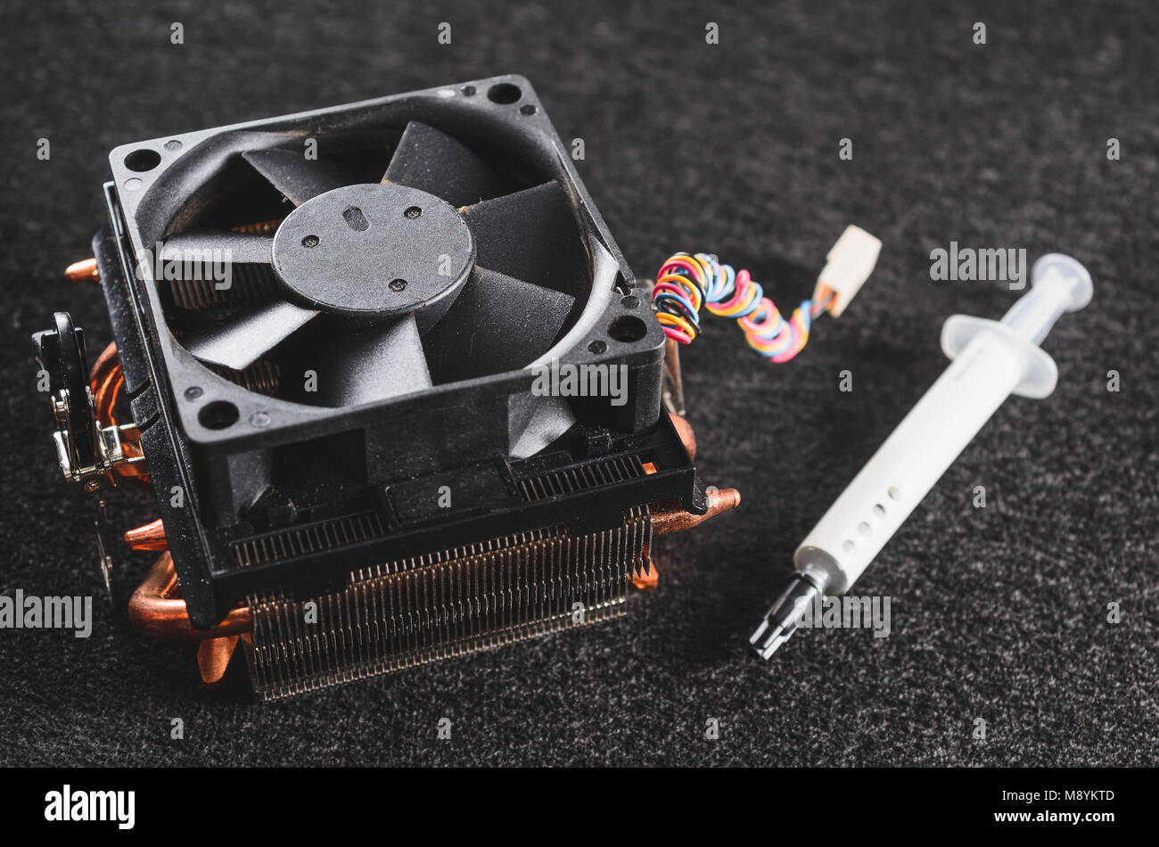 CPU heat sinker from a PC and a thermal grease. Copper heatsinker with ...