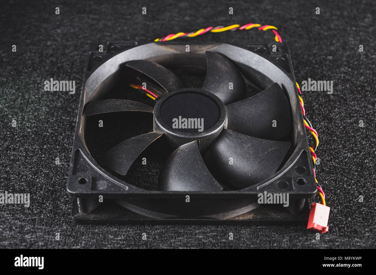 Black PC fan for cooling the case. Isolated on a dark background Stock ...