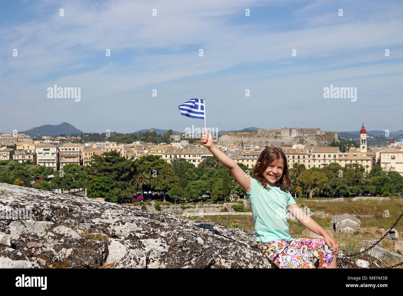 happy little girl with Greek flag Corfu town Greece Stock Photo - Alamy