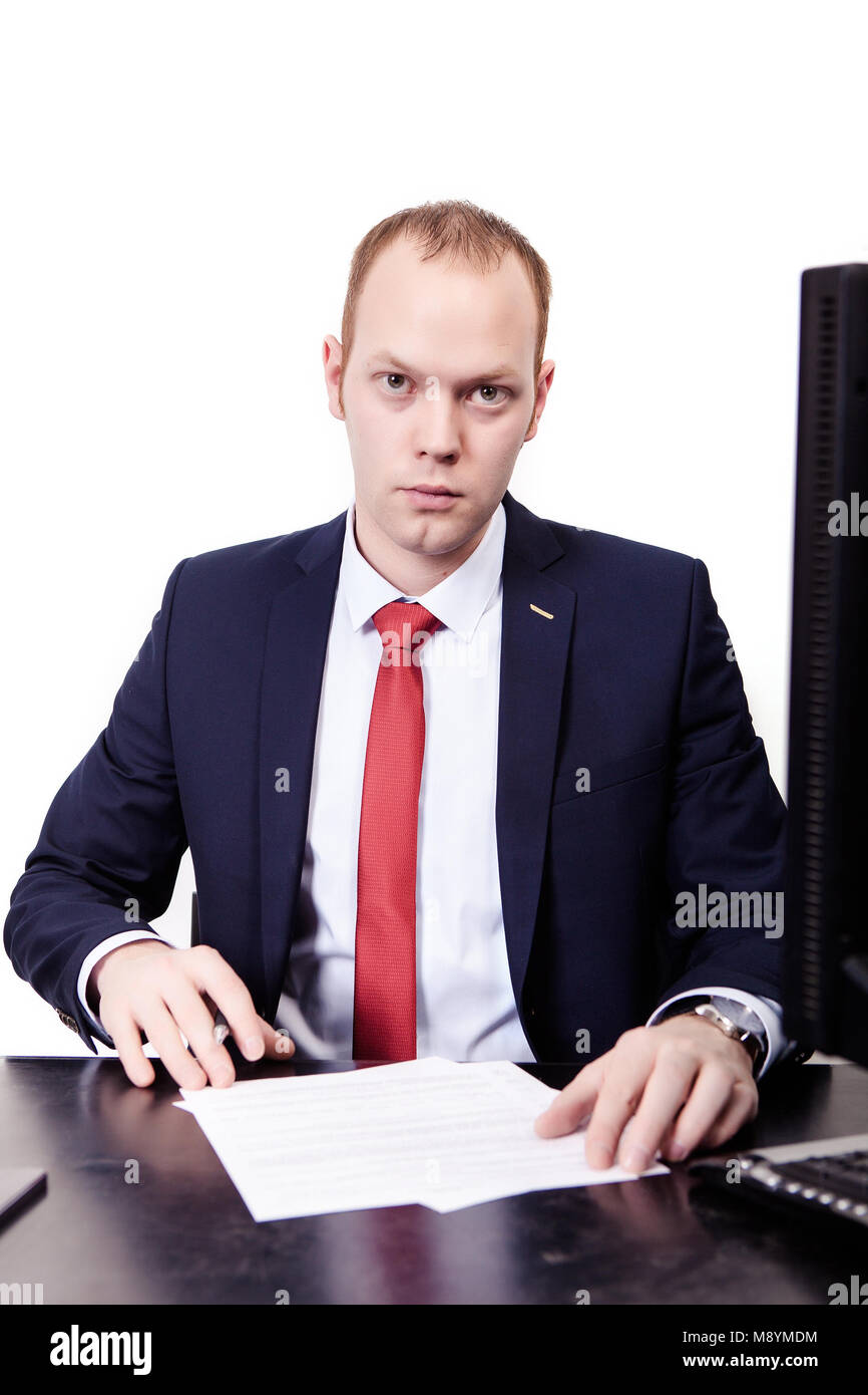 At an interview, general manager in suit with red tie with documents ...