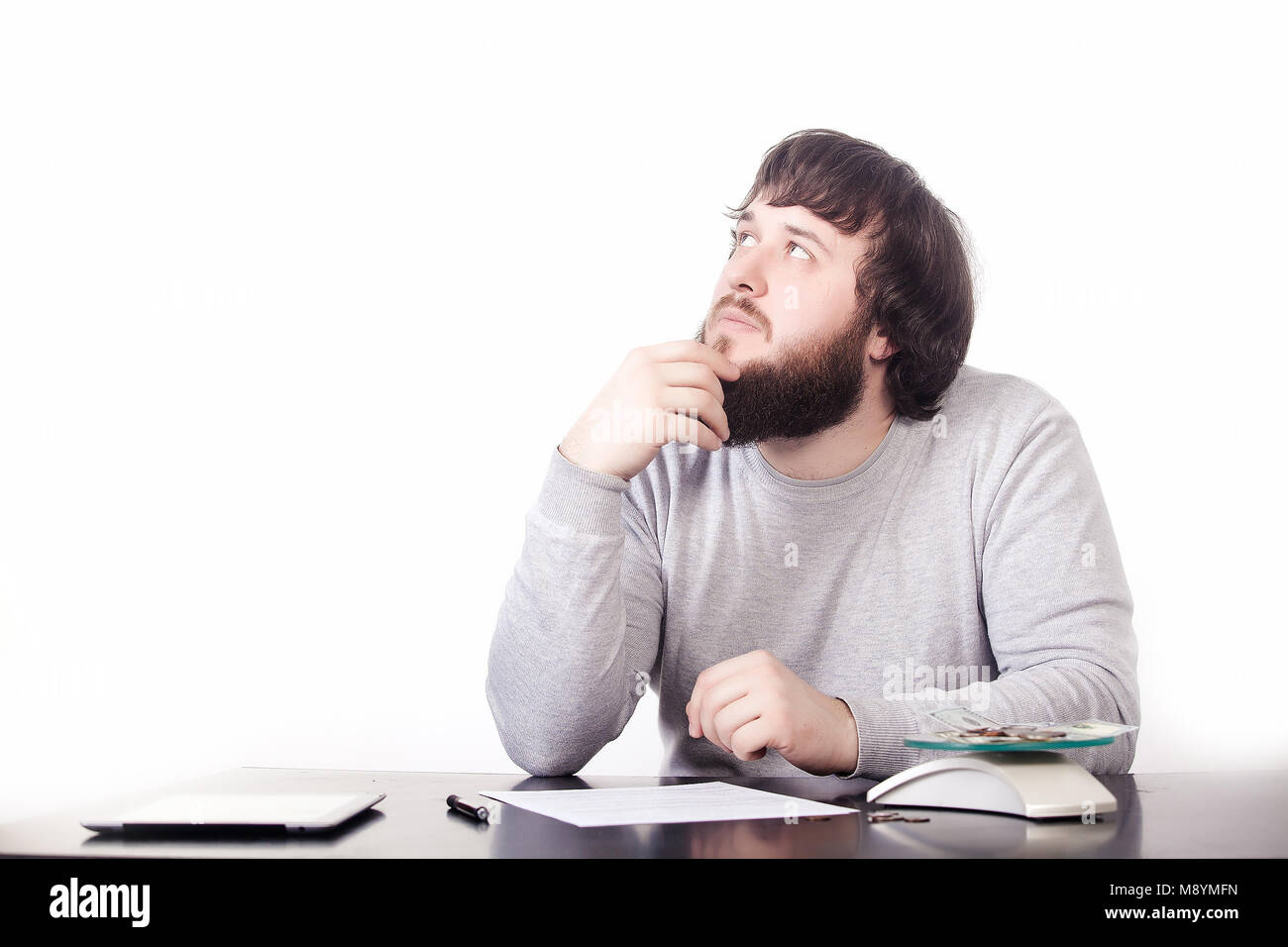 Taking time for a minute break. Thoughtful young man in formal wear ...