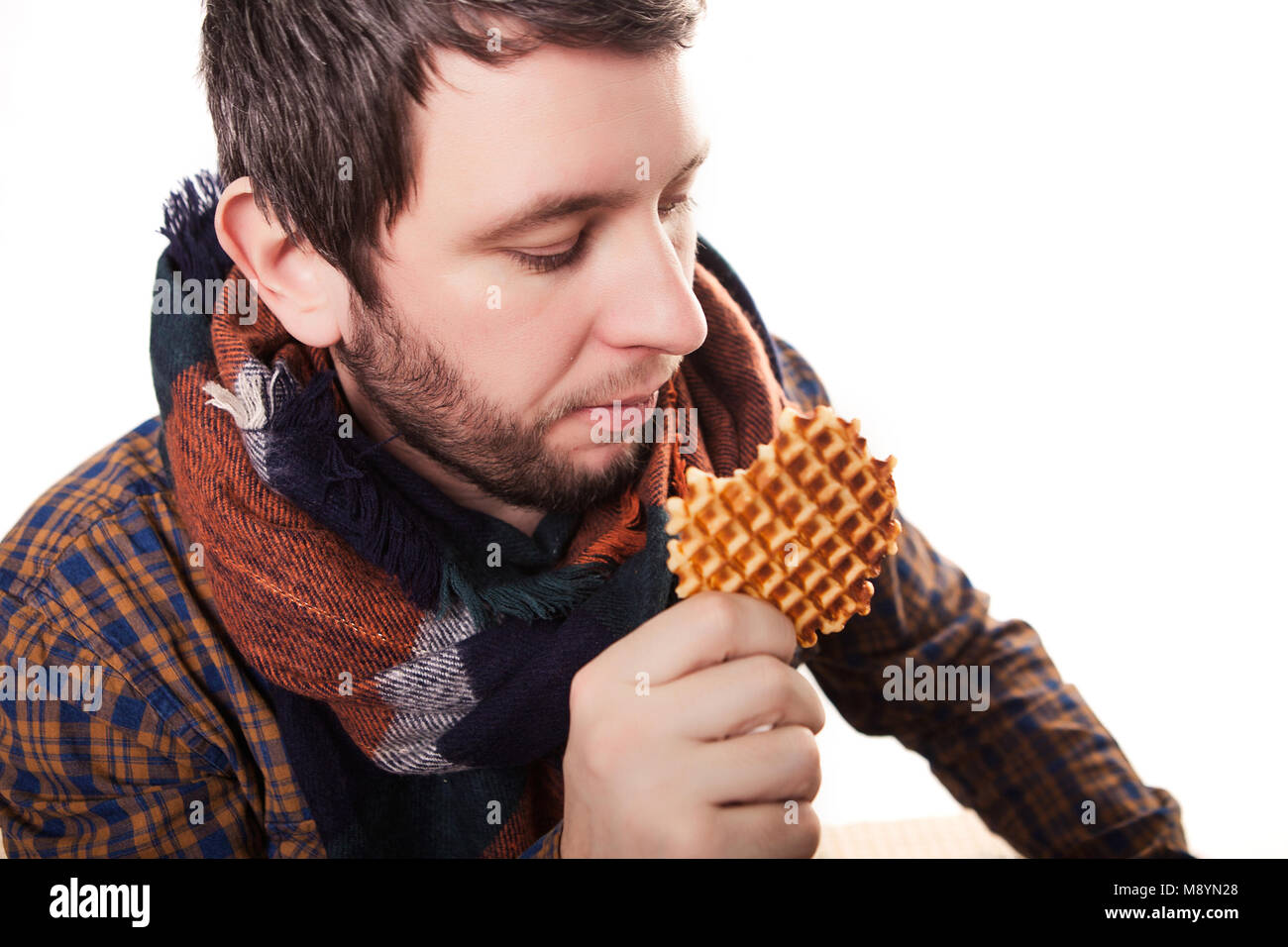 young boy sneaking a cookie into his mouth Stock Photo - Alamy