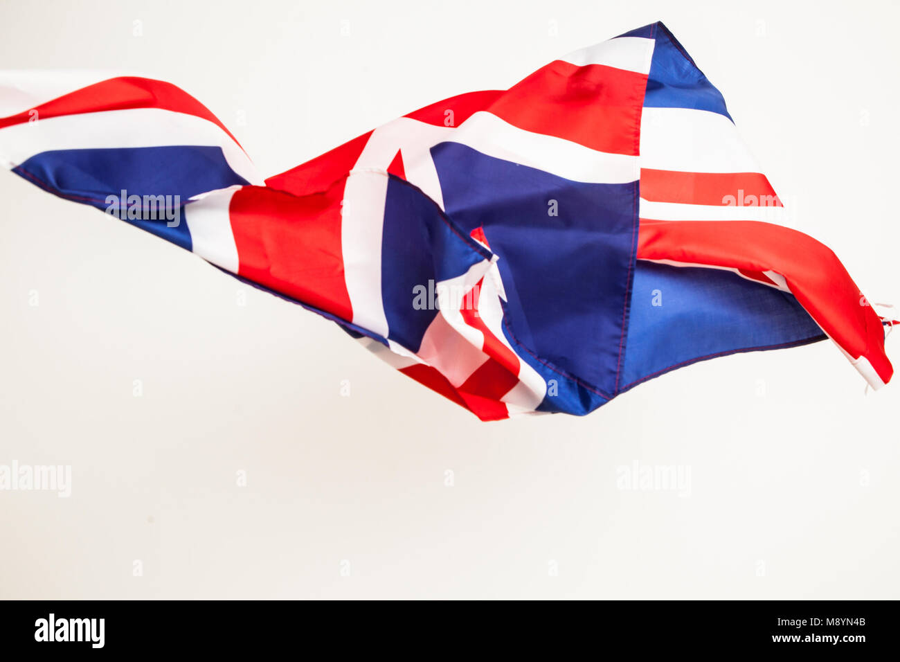 The fall of the flag of Britain. Falling leaf of a great state Stock ...