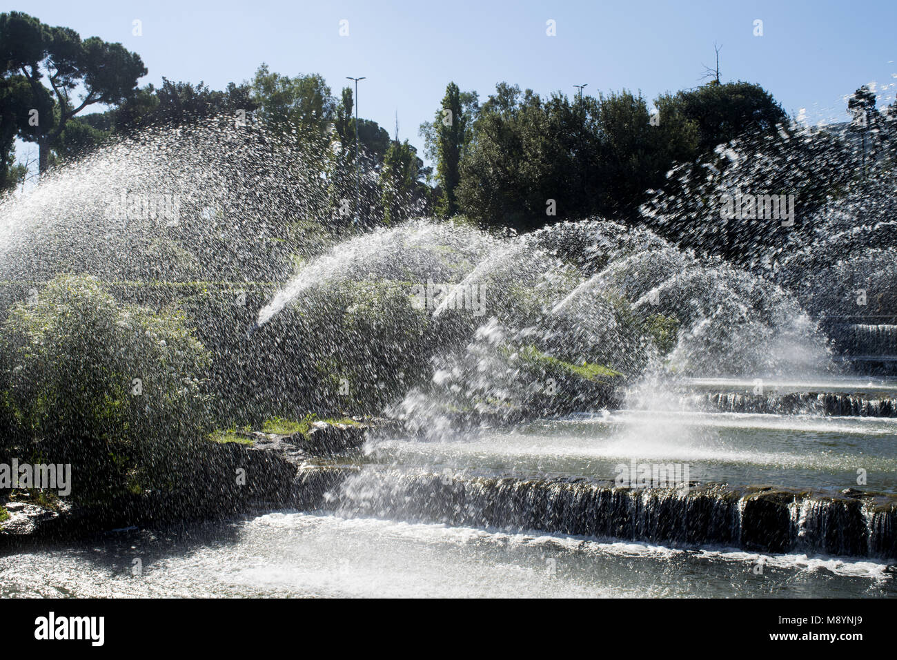 jet and splashes of water on an artificial rivulet Stock Photo - Alamy