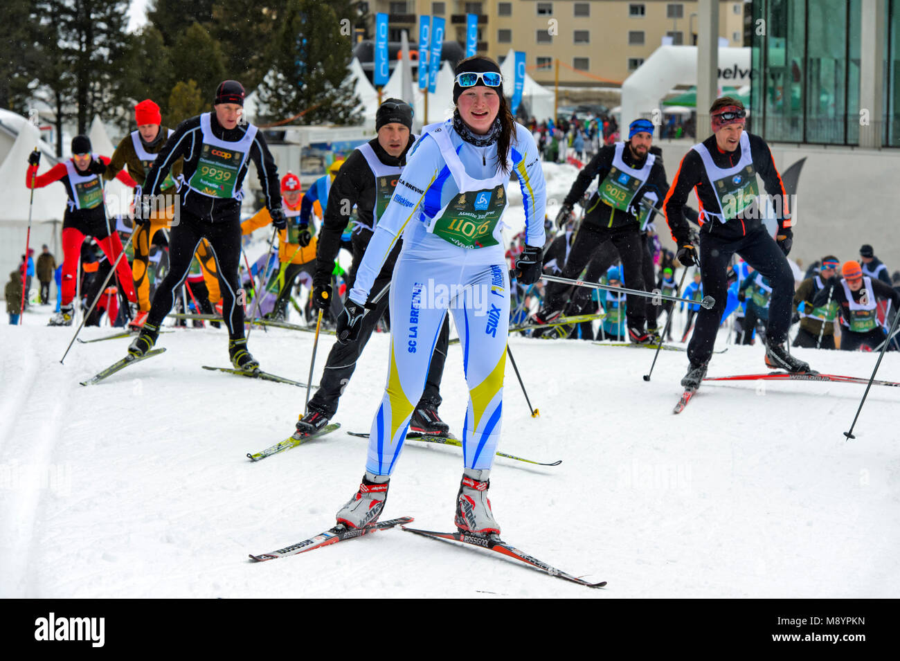 Cross country skiers at the Engadin Skimarathon on the climb to the ...