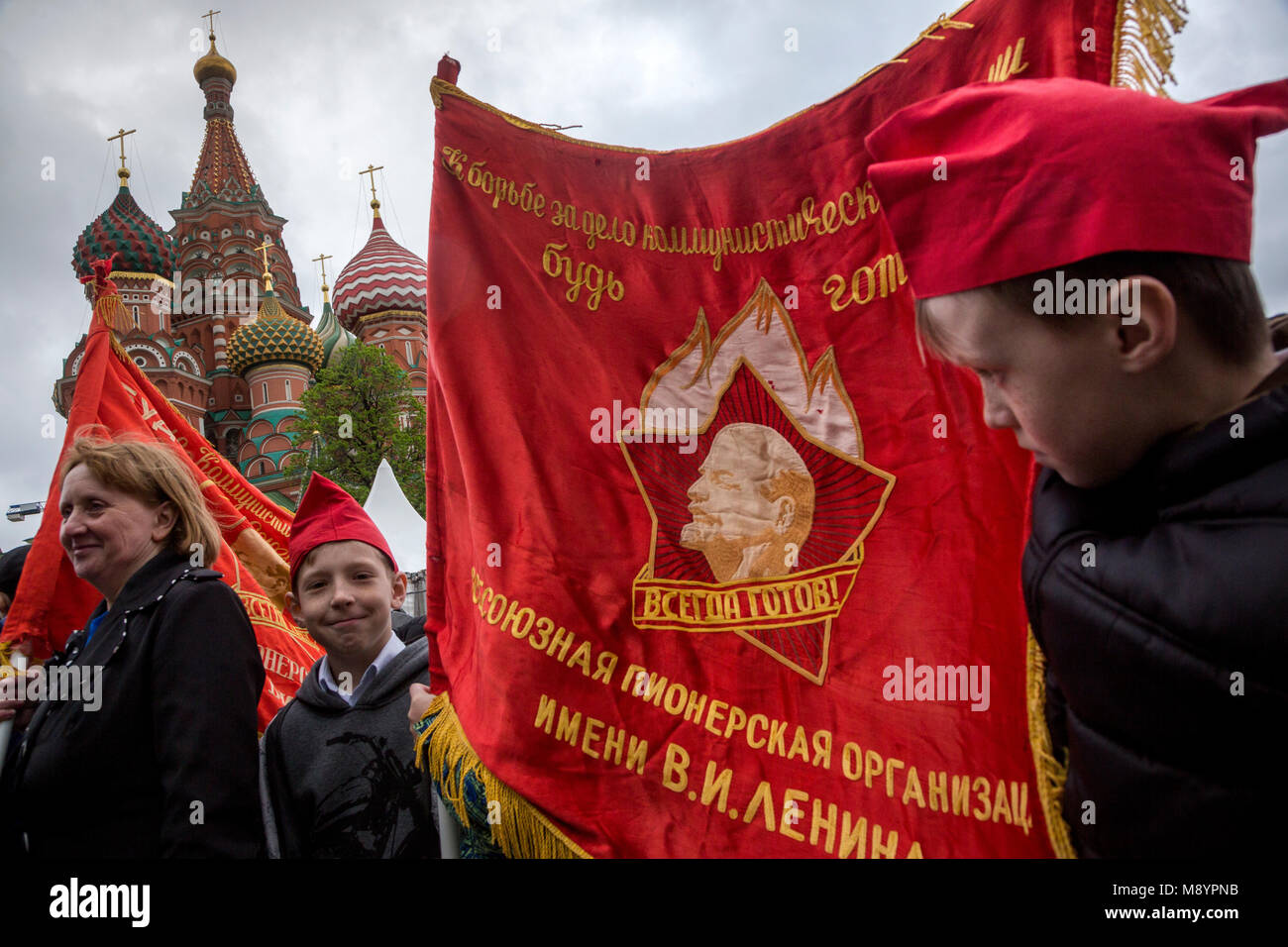 Schoolchildren attend a ceremony to admit children into the Pioneer ...