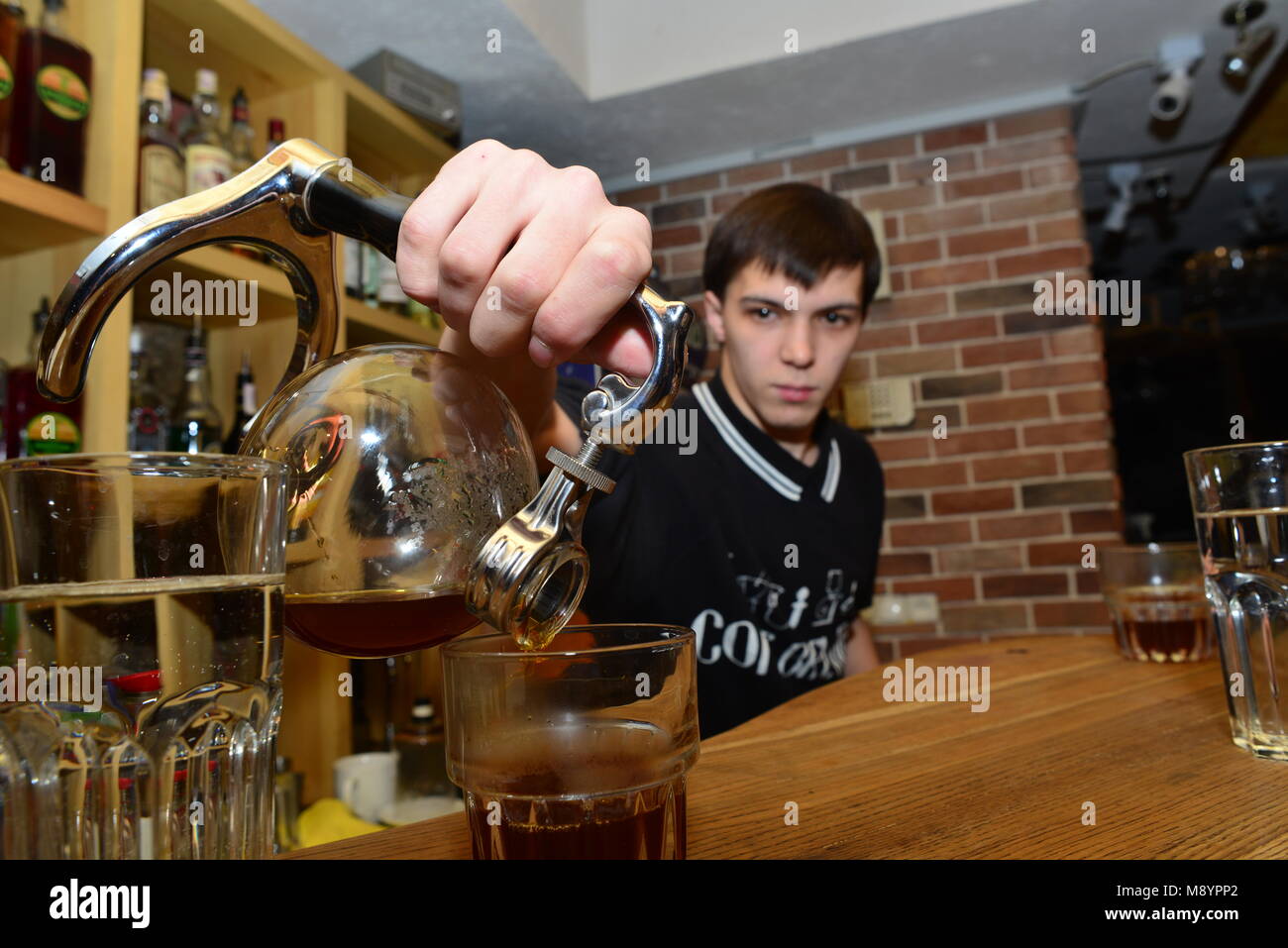 Barista, brewing coffee Stock Photo - Alamy