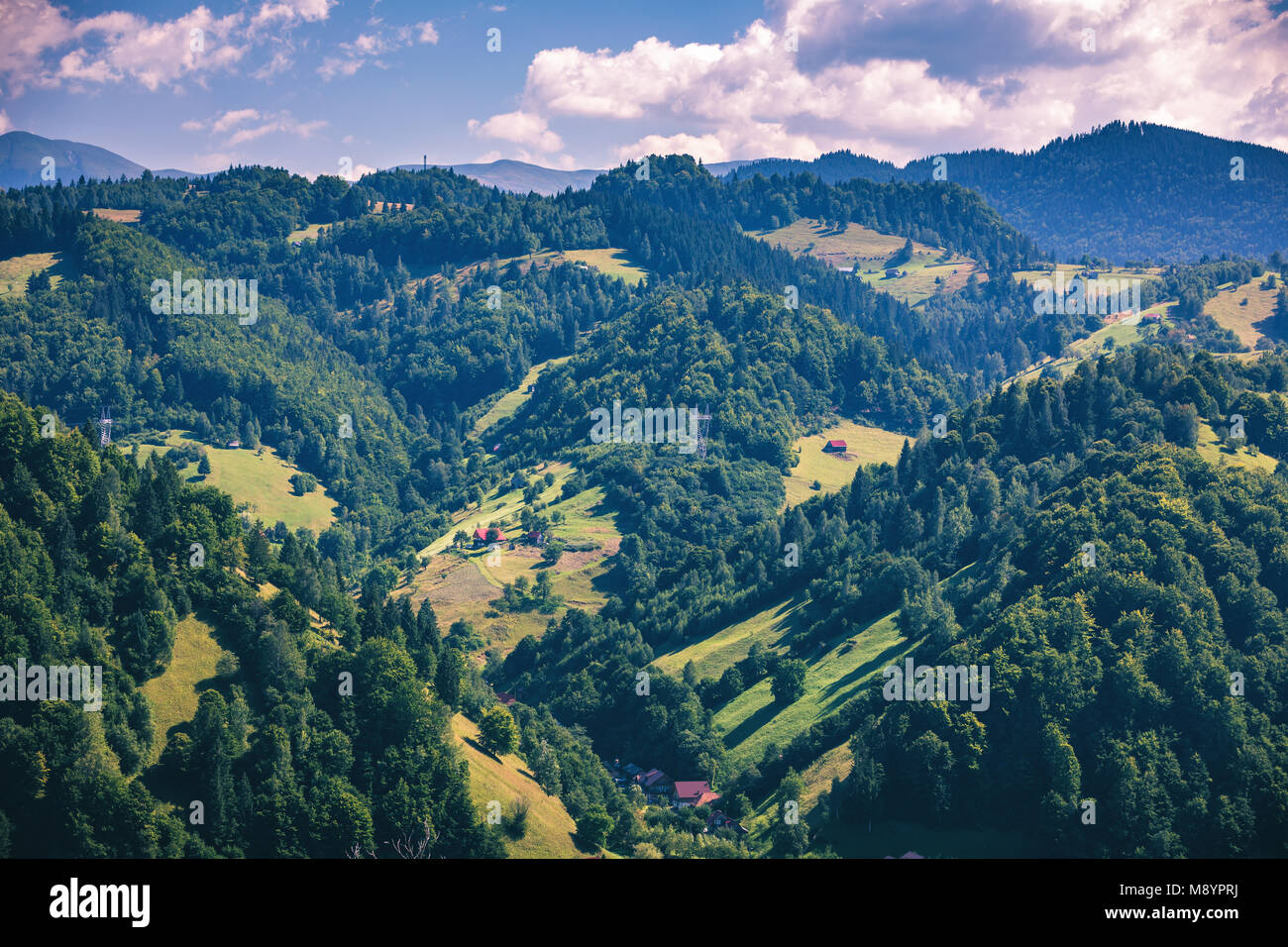 Stunning alpine landscape and green fields, Transylvania, Romania ...