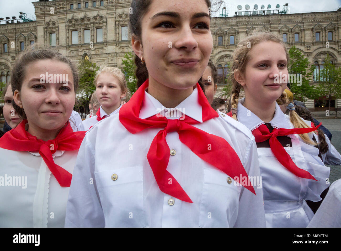 Schoolchildren attend a ceremony to admit children into the Pioneer ...