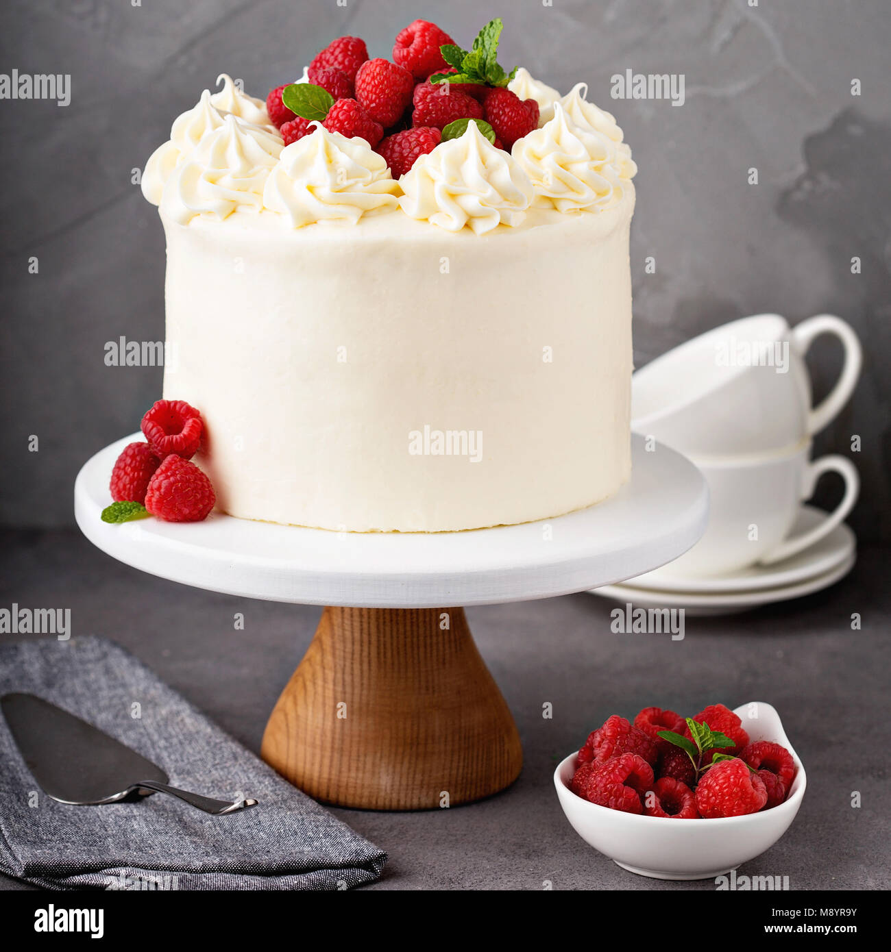 Vanilla raspberry cake with white frosting Stock Photo - Alamy