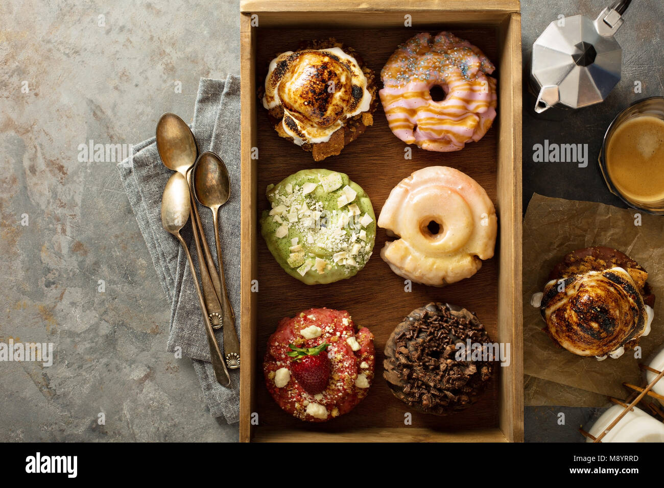 Variety of donuts in a wooden box Stock Photo - Alamy