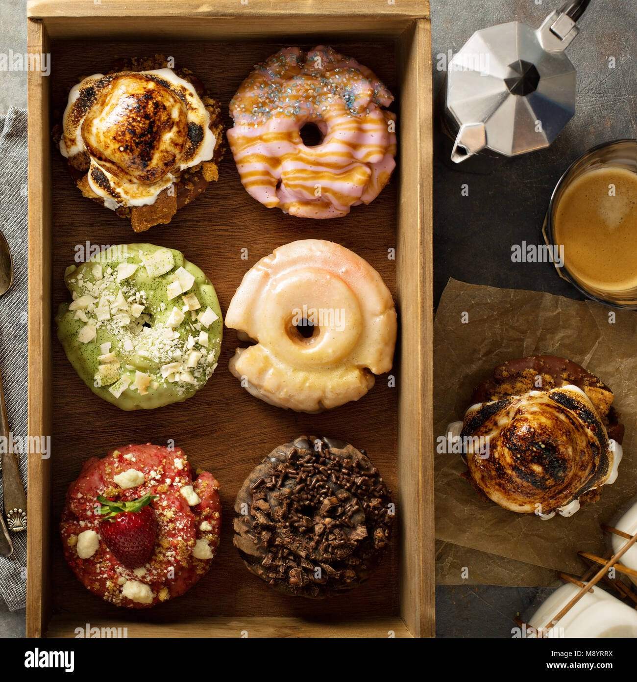 Variety of donuts in a wooden box Stock Photo - Alamy