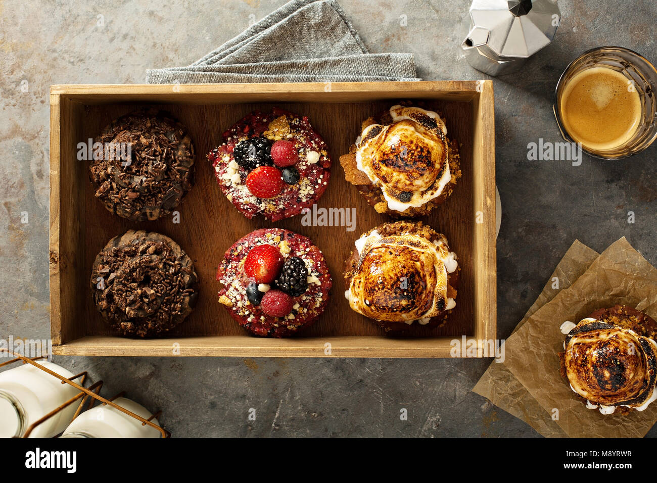 Variety of donuts in a wooden box Stock Photo - Alamy