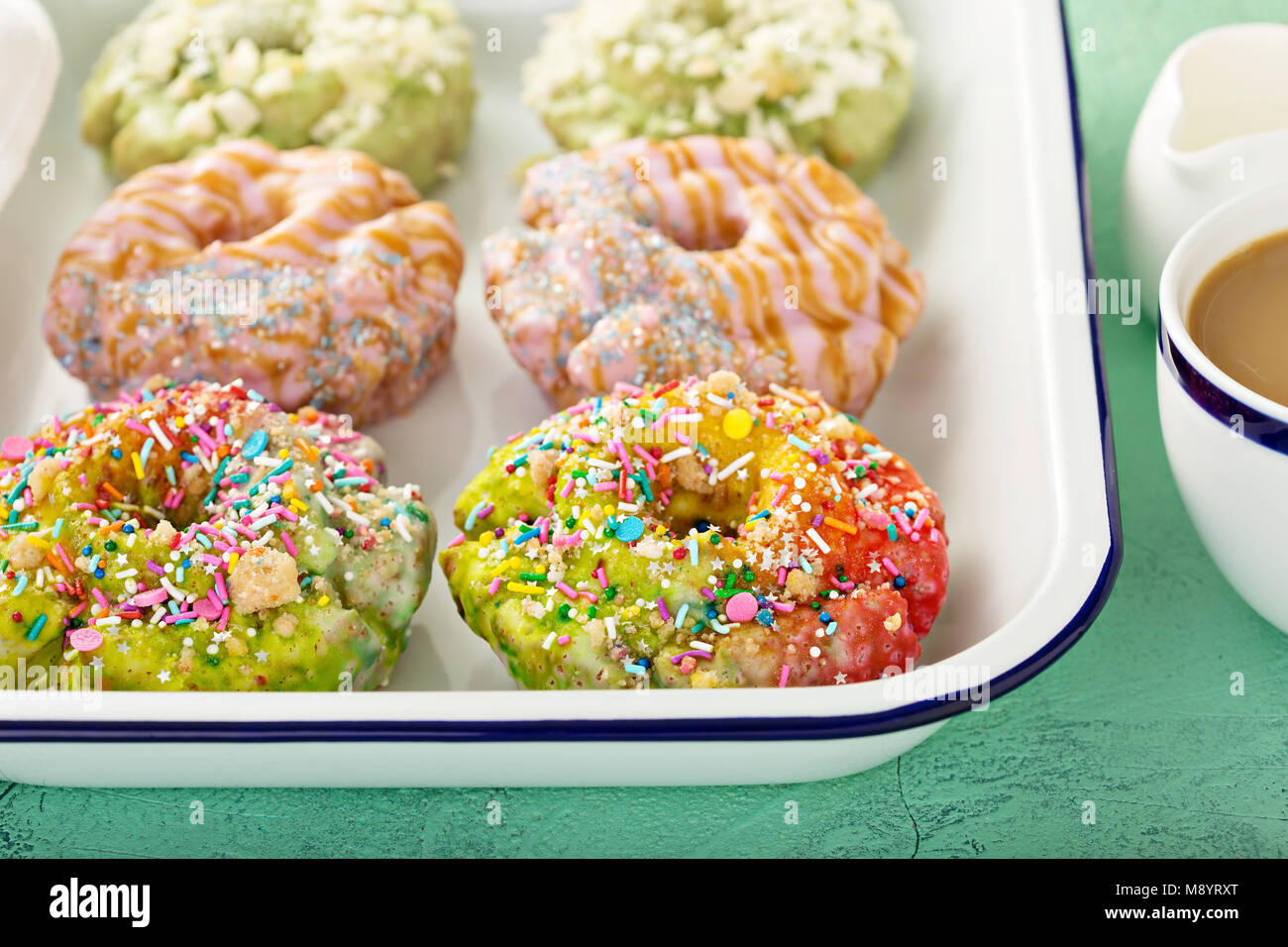 Variety of donuts in a wooden box Stock Photo - Alamy