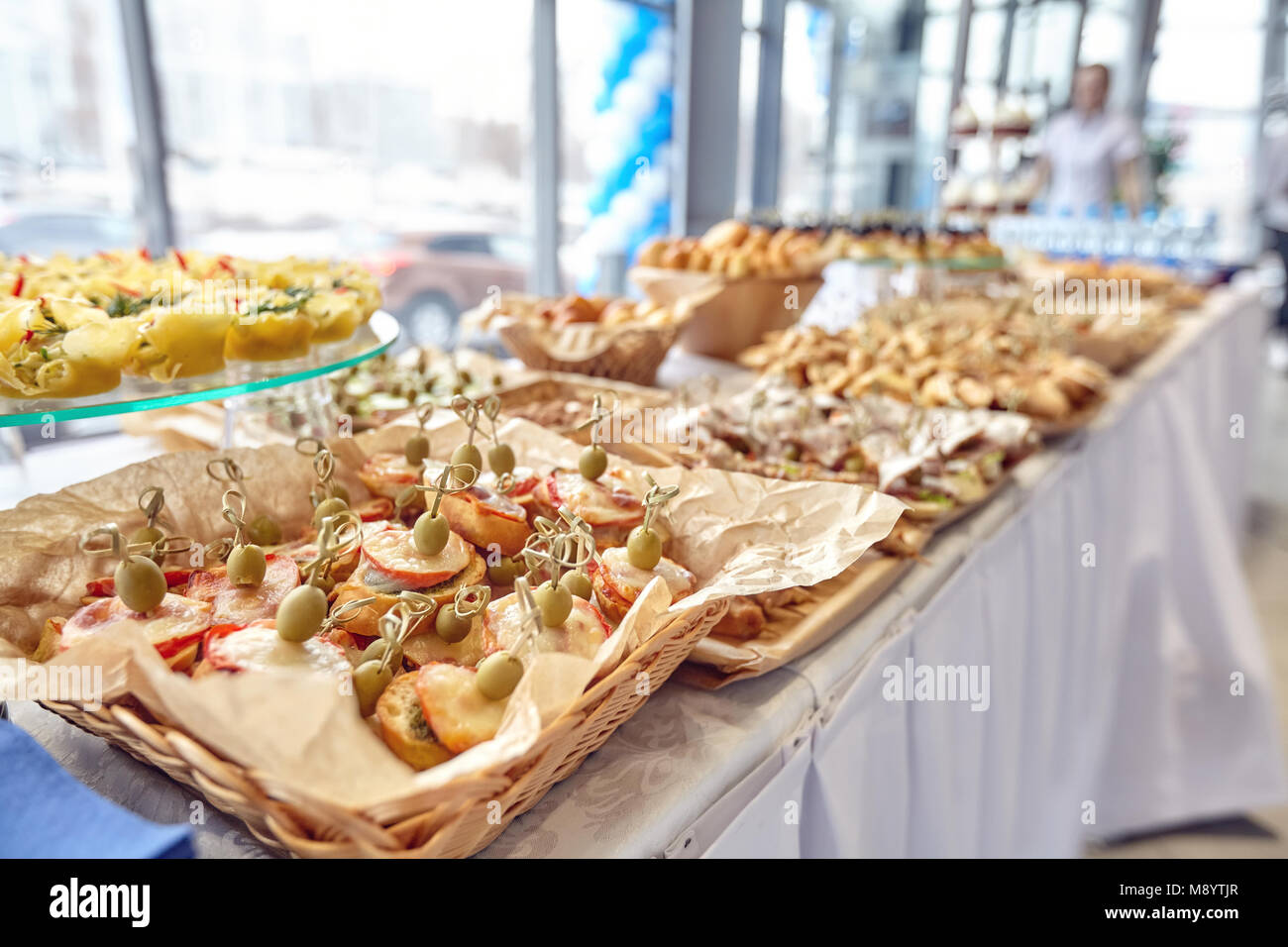 Catering of snacks, canapes and patties on table Stock Photo - Alamy