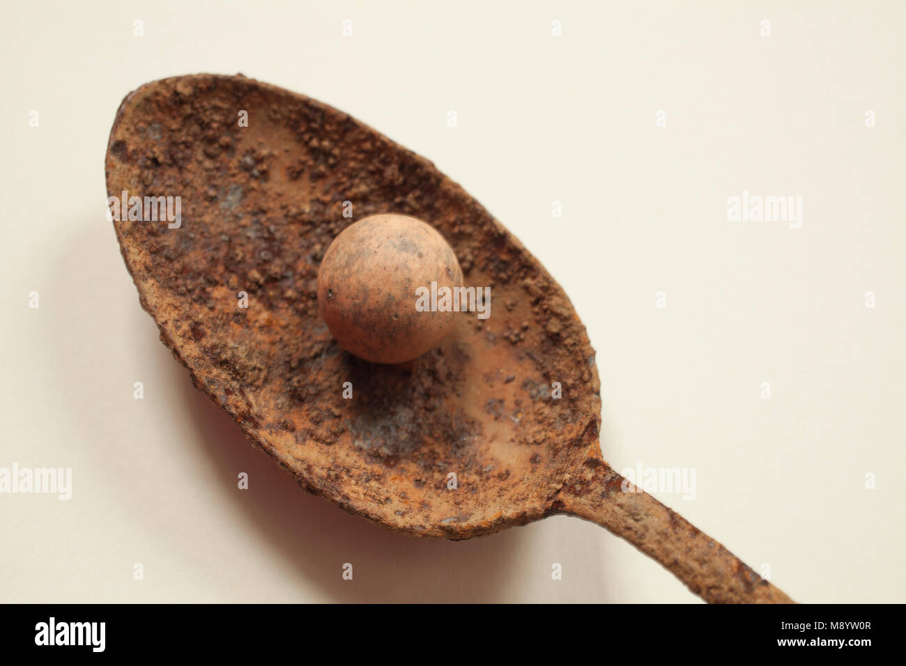 Spoon holding hi-res stock photography and images - Alamy