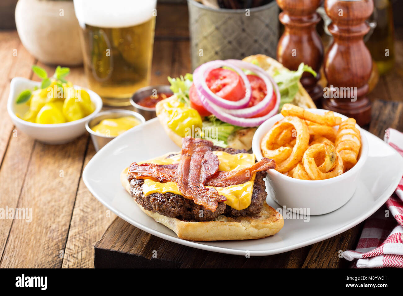 Traditional american burger with cheese and bacon Stock Photo - Alamy