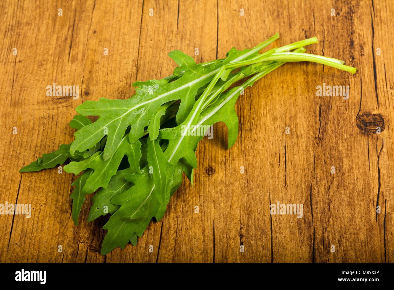 Green fresh Rucola leaves Stock Photo - Alamy