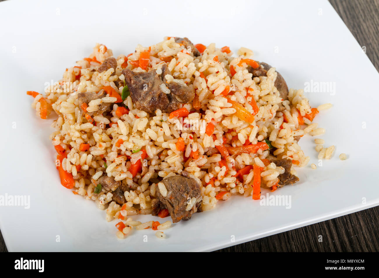 Asian rice - Plov with meat and carrot Stock Photo - Alamy